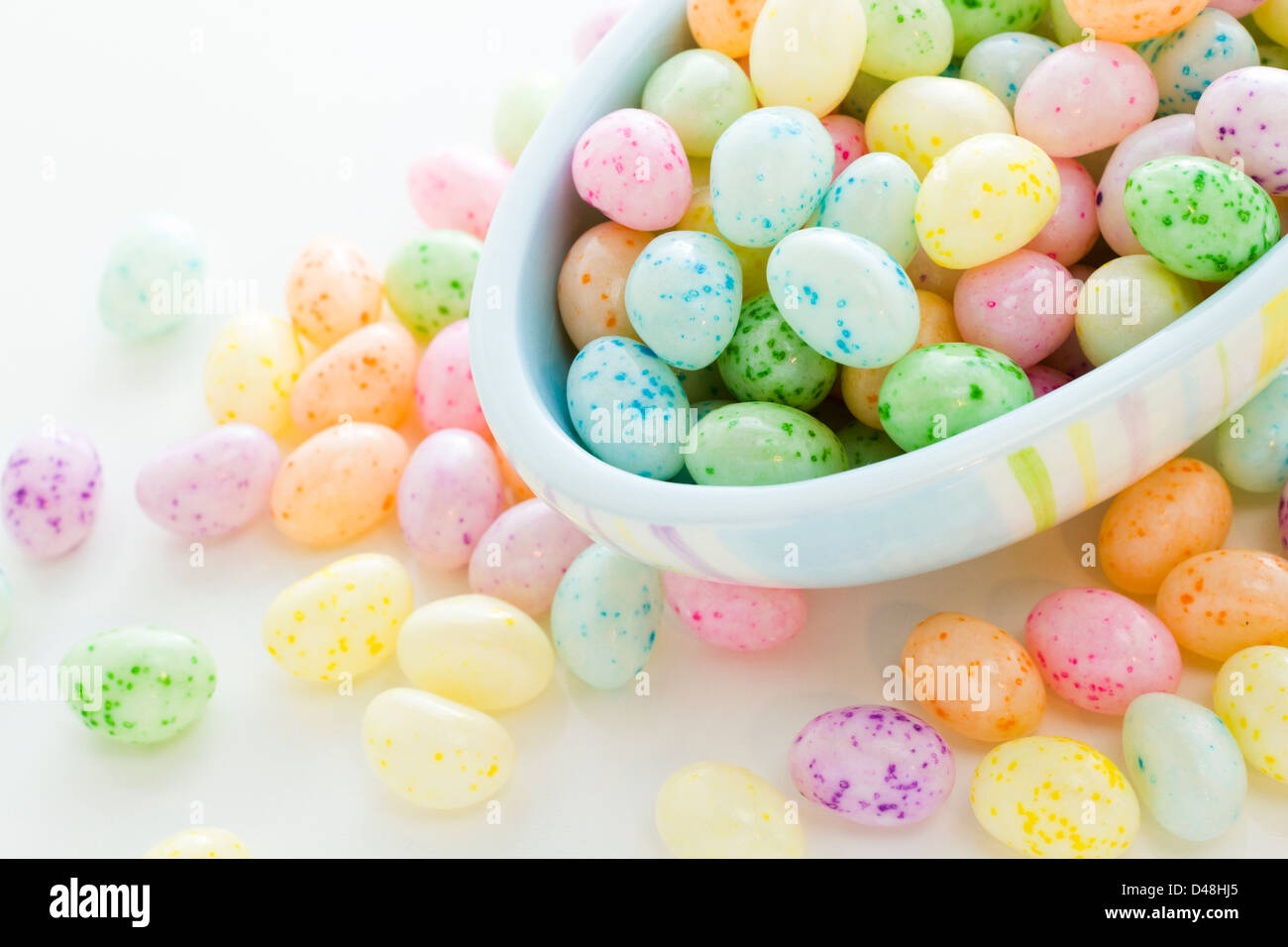 Assorted jelly beans in pastel colors with darker spots Stock Photo - Alamy