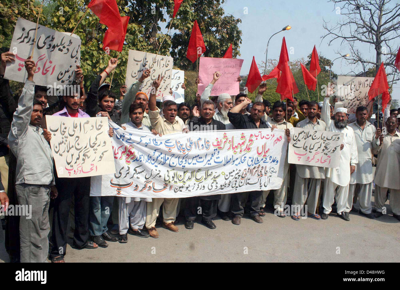 Members of All Pakistan (PWD) Workers Union chant slogans for ...
