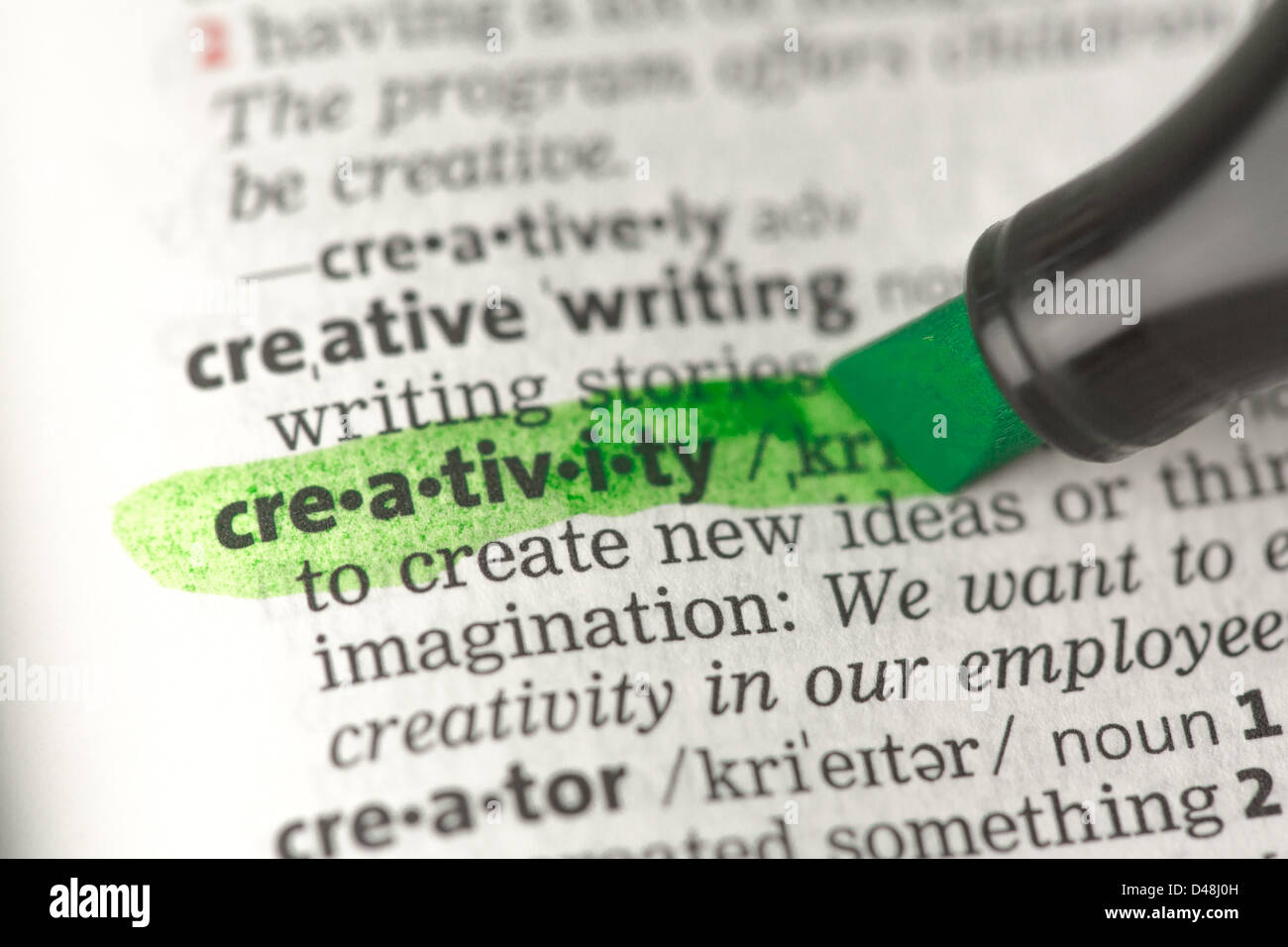 Creativity definition highlighted in green Stock Photo - Alamy