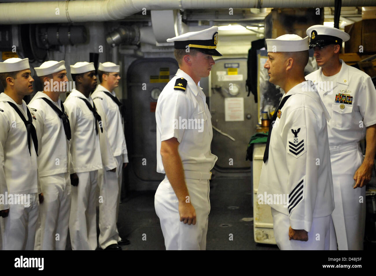 An officer conducts a uniform inspection at sea Stock Photo - Alamy