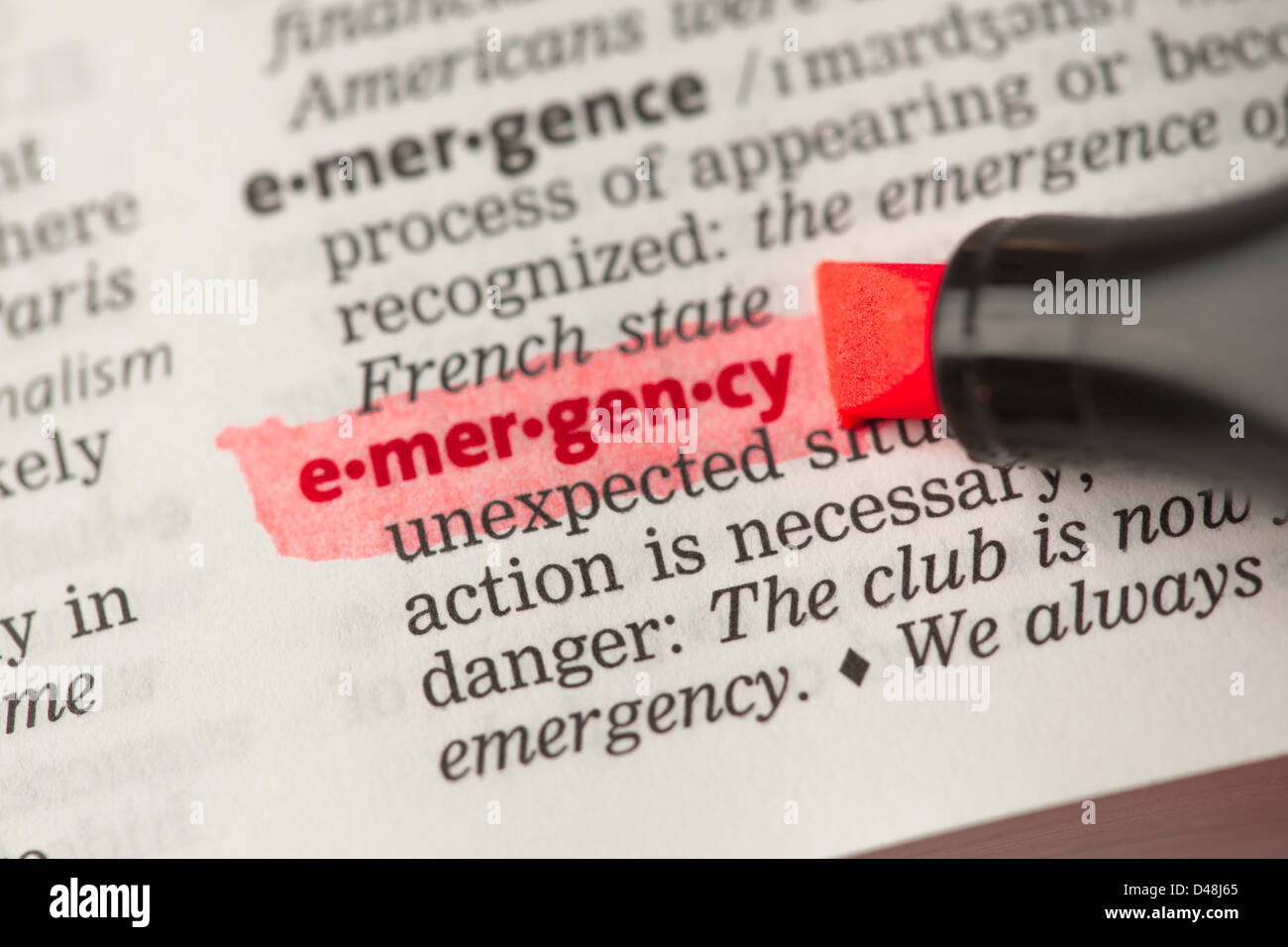 Emergency definition highlighted in red Stock Photo - Alamy