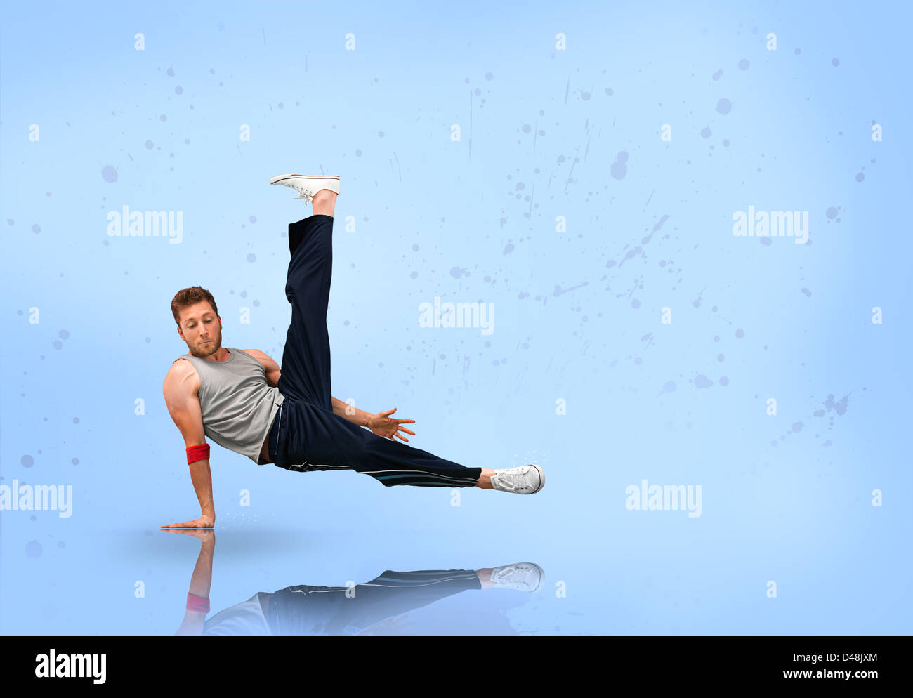 Break dancer balancing on one hand Stock Photo - Alamy