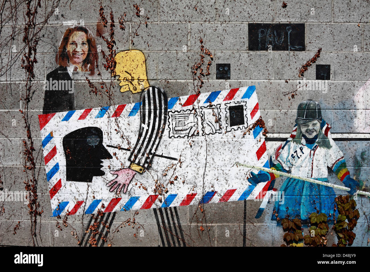 Likely a combination of an old public art project and graffiti on the ...