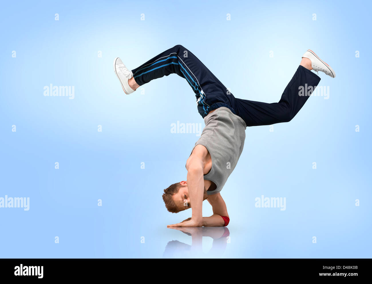 Break dancer balancing on his forearms Stock Photo - Alamy