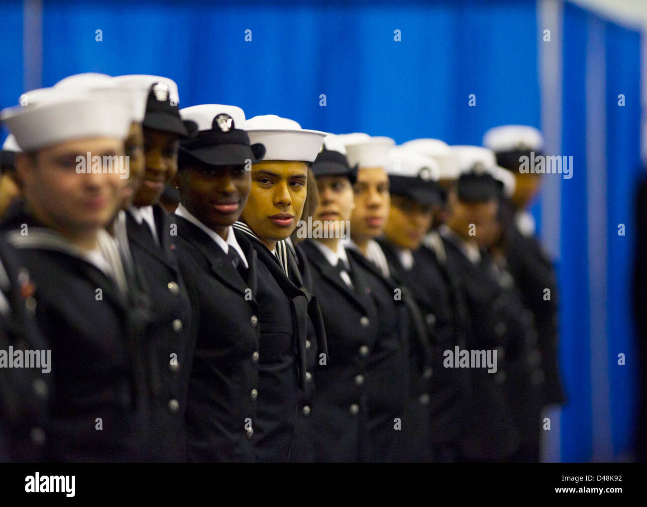 Sailors stand in formation during a military ceremony at Newport News ...
