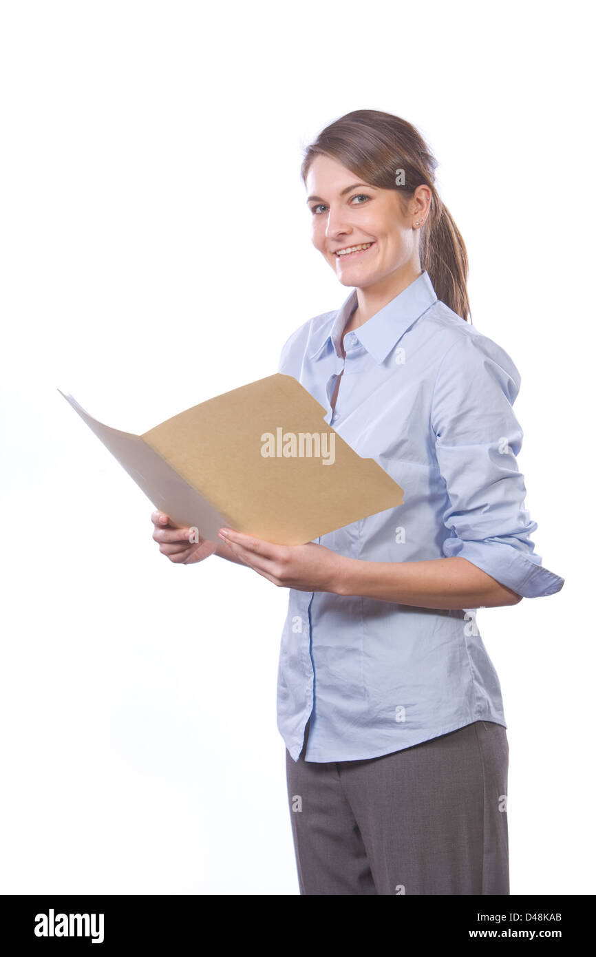 Business woman reading documents in modern office Stock Photo - Alamy