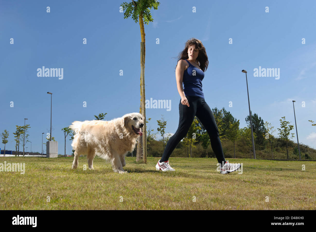 Females walking dog hi-res stock photography and images - Alamy