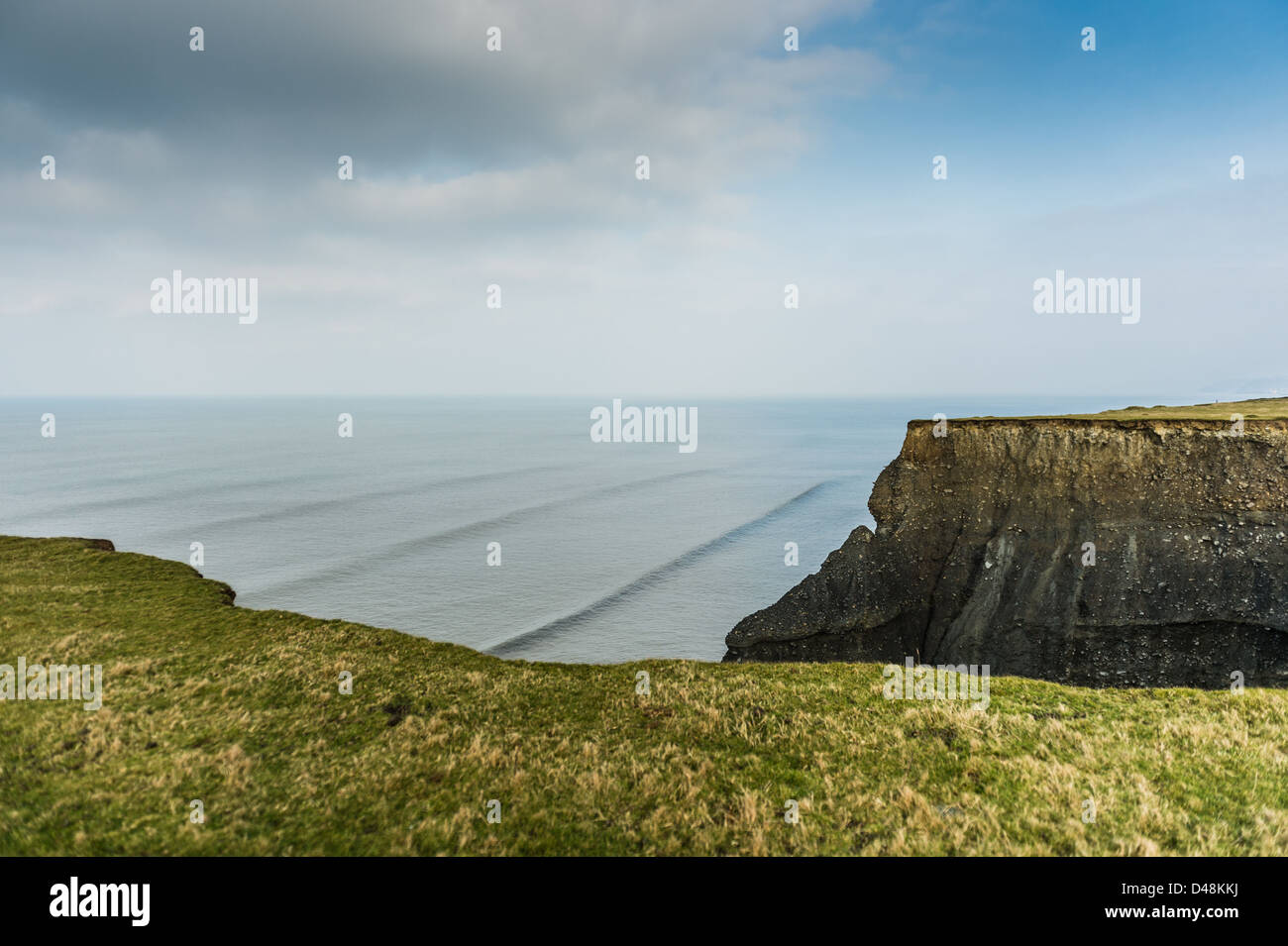 Erosion of the clay and glacial rubble cliffs at Morfa Bychan on the ...