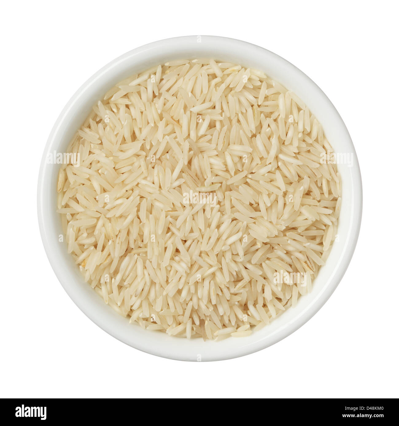 Basmati rice in a bowl isolated on white background Stock Photo - Alamy