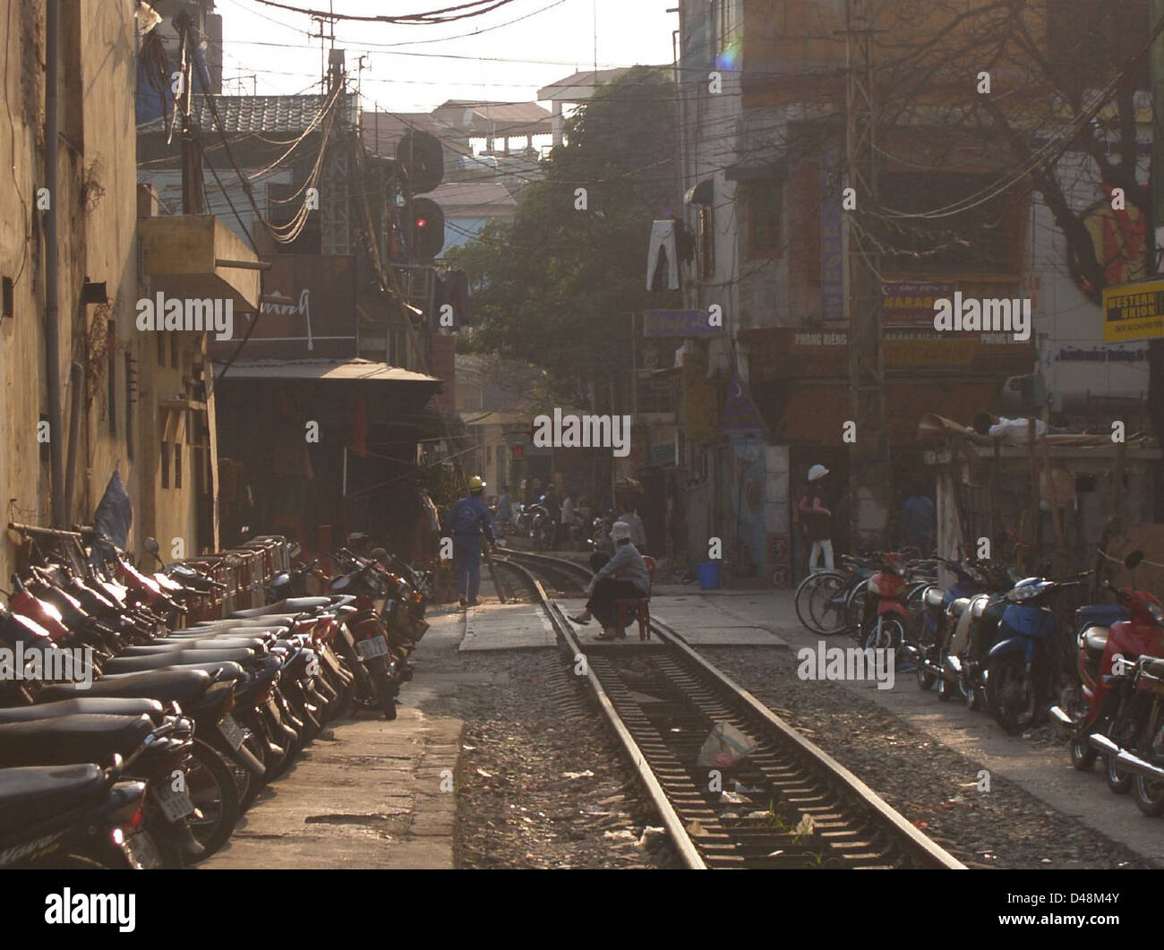 The Hanoi railway crossing, one of the busiest and most iconic ...