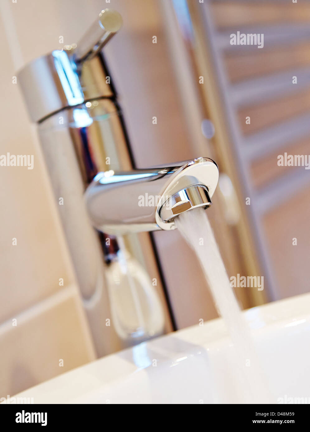 Tap with running water Stock Photo - Alamy