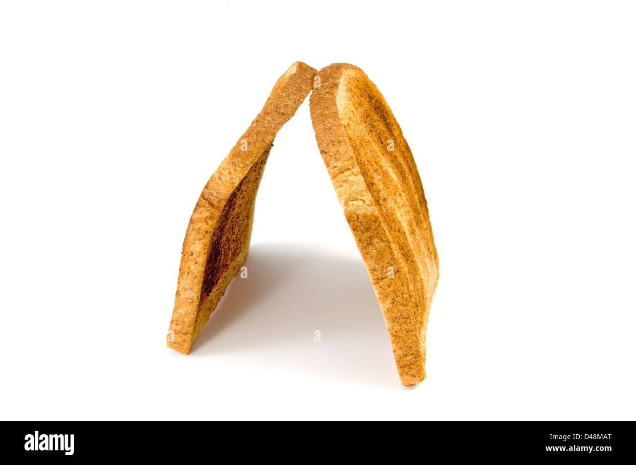 Two slices of toast on white background Stock Photo - Alamy