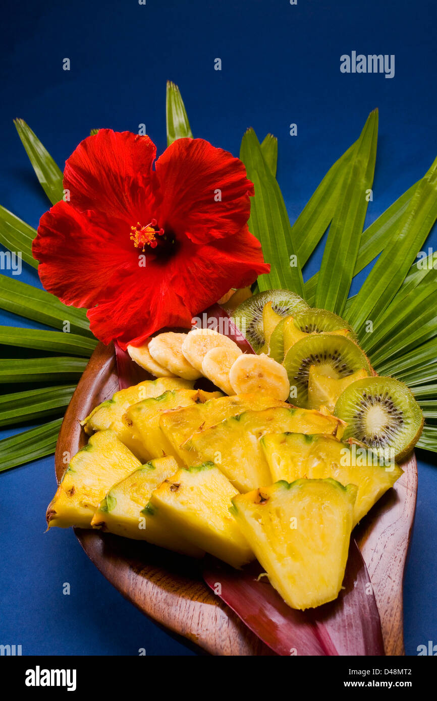 Studio Shot Pf A Variety Of Tropical Fruit Sliced On A Platter, With ...