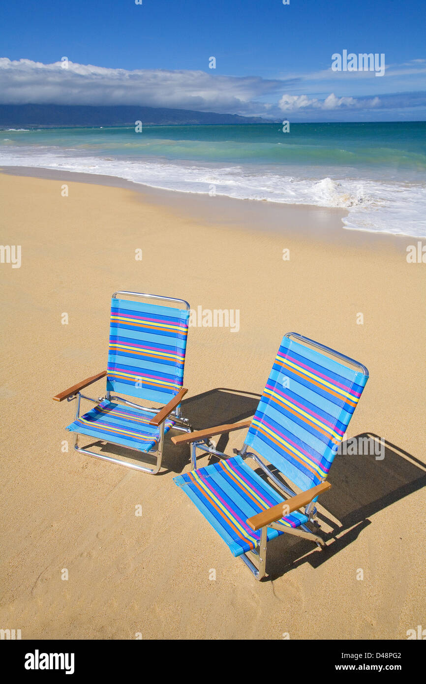 Brightly Colored Beach Chairs On The Sand Near The Ocean Stock Photo ...