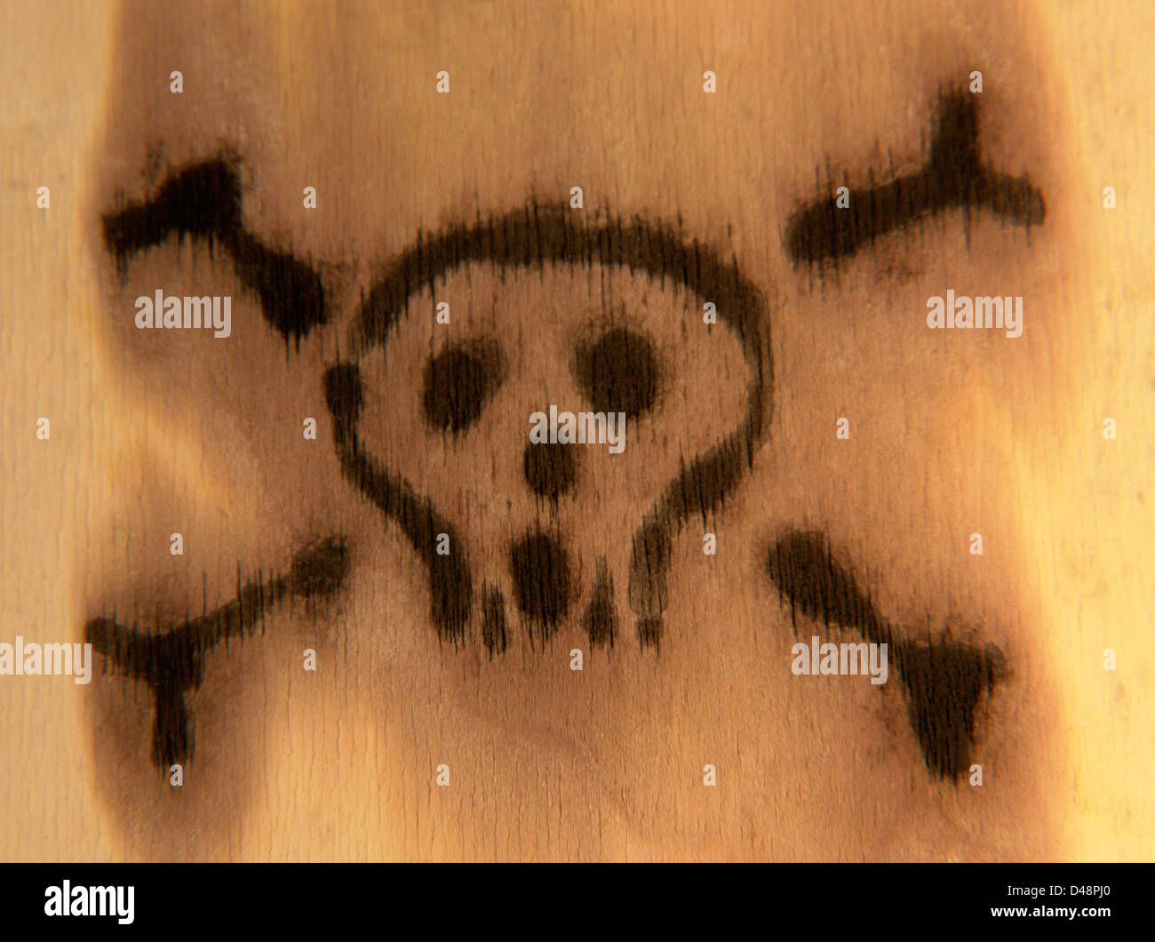 detail of a symbolic skull wich is painted with acid on wood Stock ...