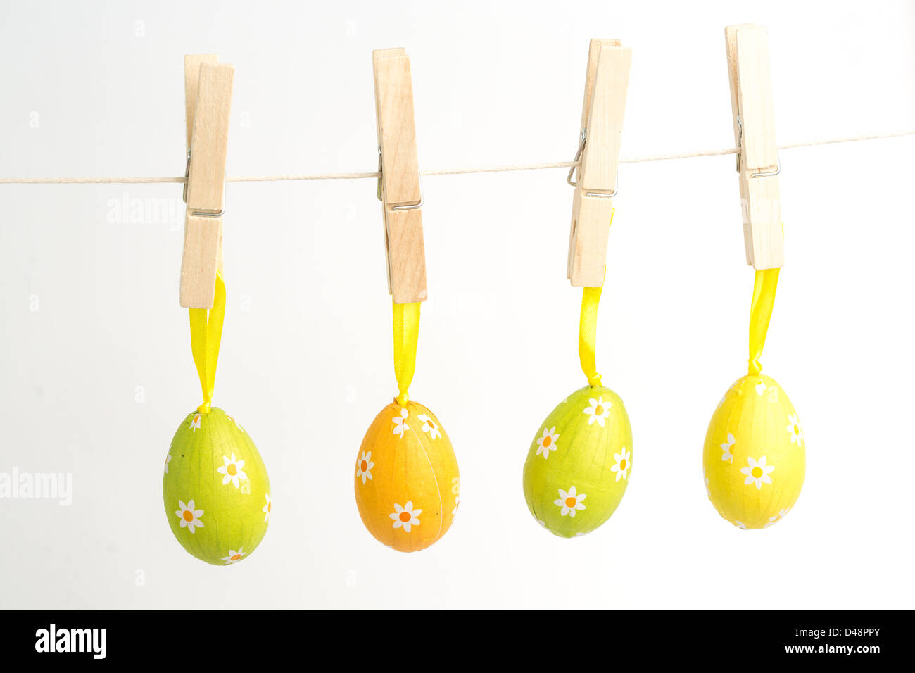 Hanging from a ribbon hi-res stock photography and images - Alamy