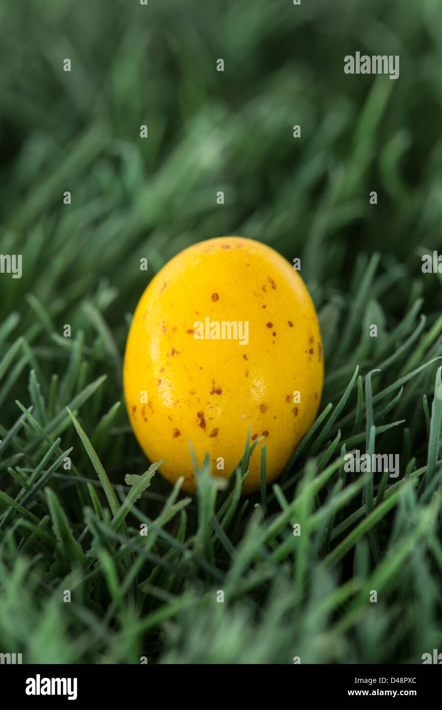 Small yellow easter egg Stock Photo - Alamy