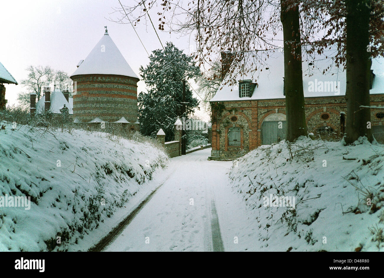 Village street in snow, Normandy, France Stock Photo - Alamy