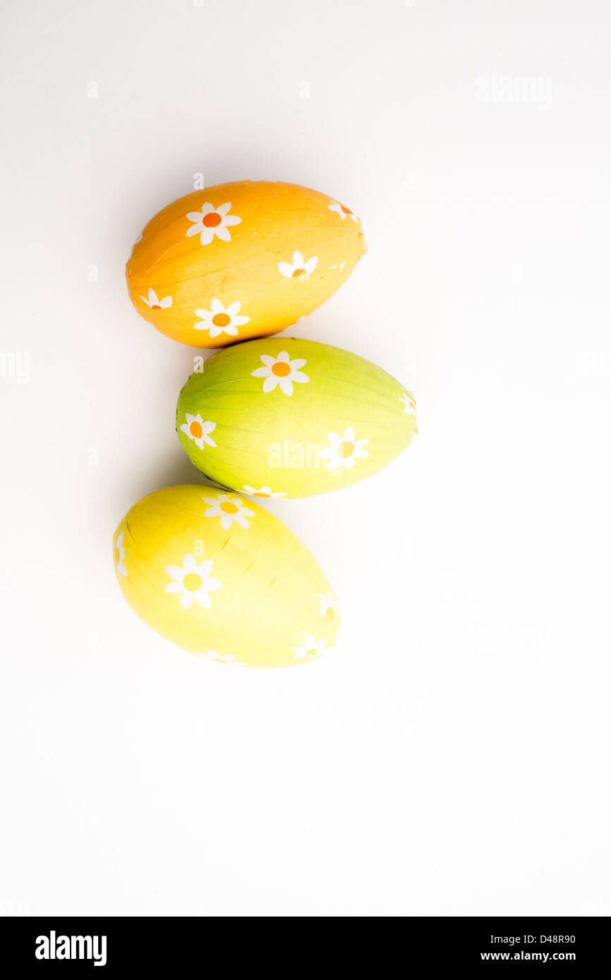 Overhead of three easter eggs Stock Photo - Alamy