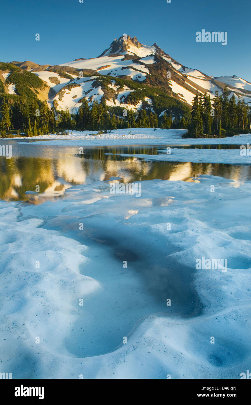 Mount Jefferson seen from ice covered Russell Lake in Jefferson Park ...
