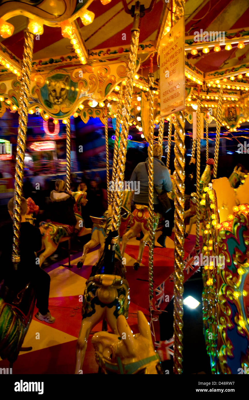 Point of view from a horse on a traditional old fairground galloper ...