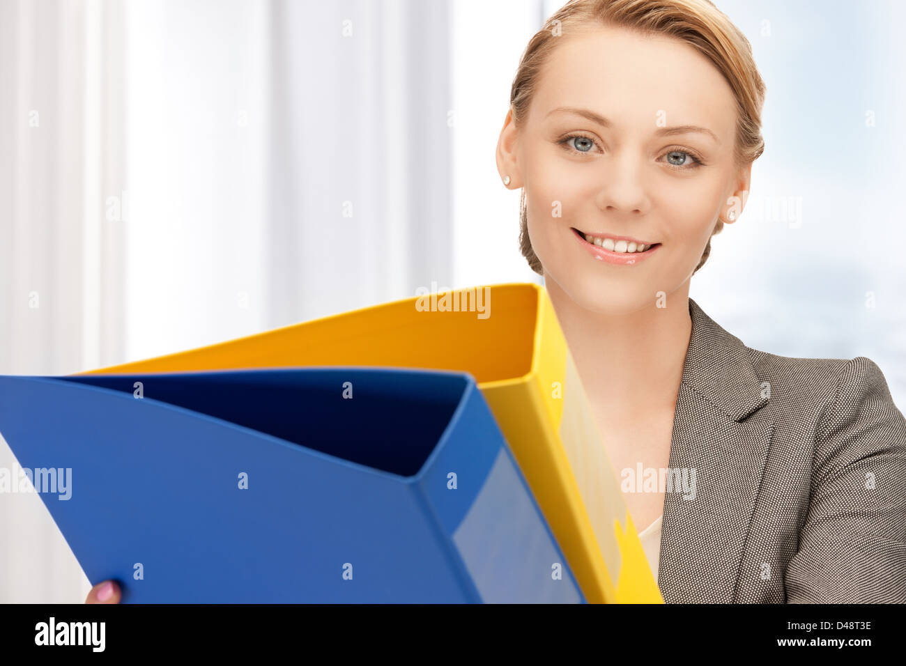 woman with folders Stock Photo - Alamy