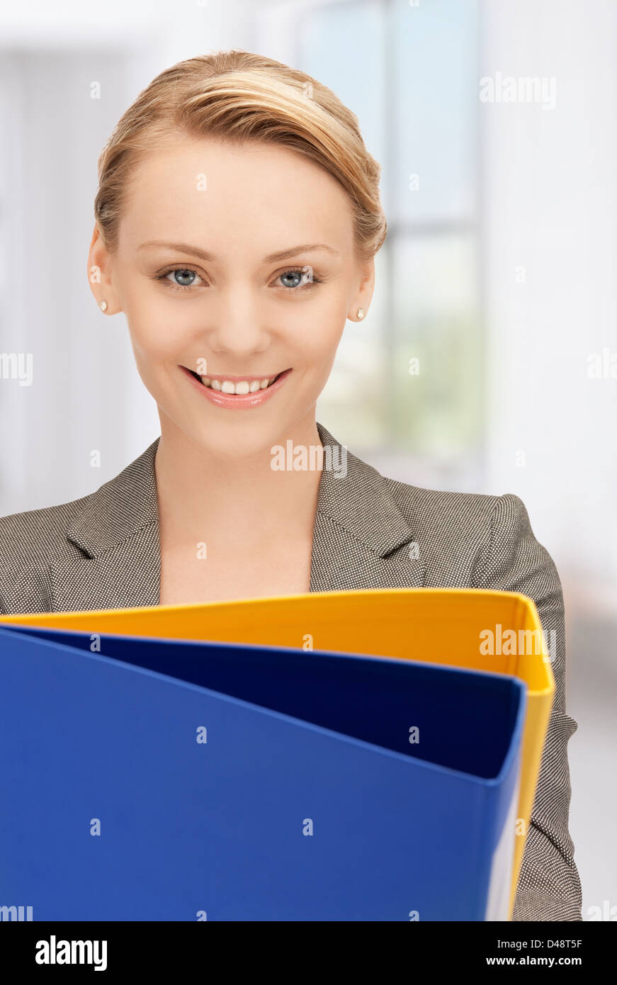 woman with folders Stock Photo - Alamy