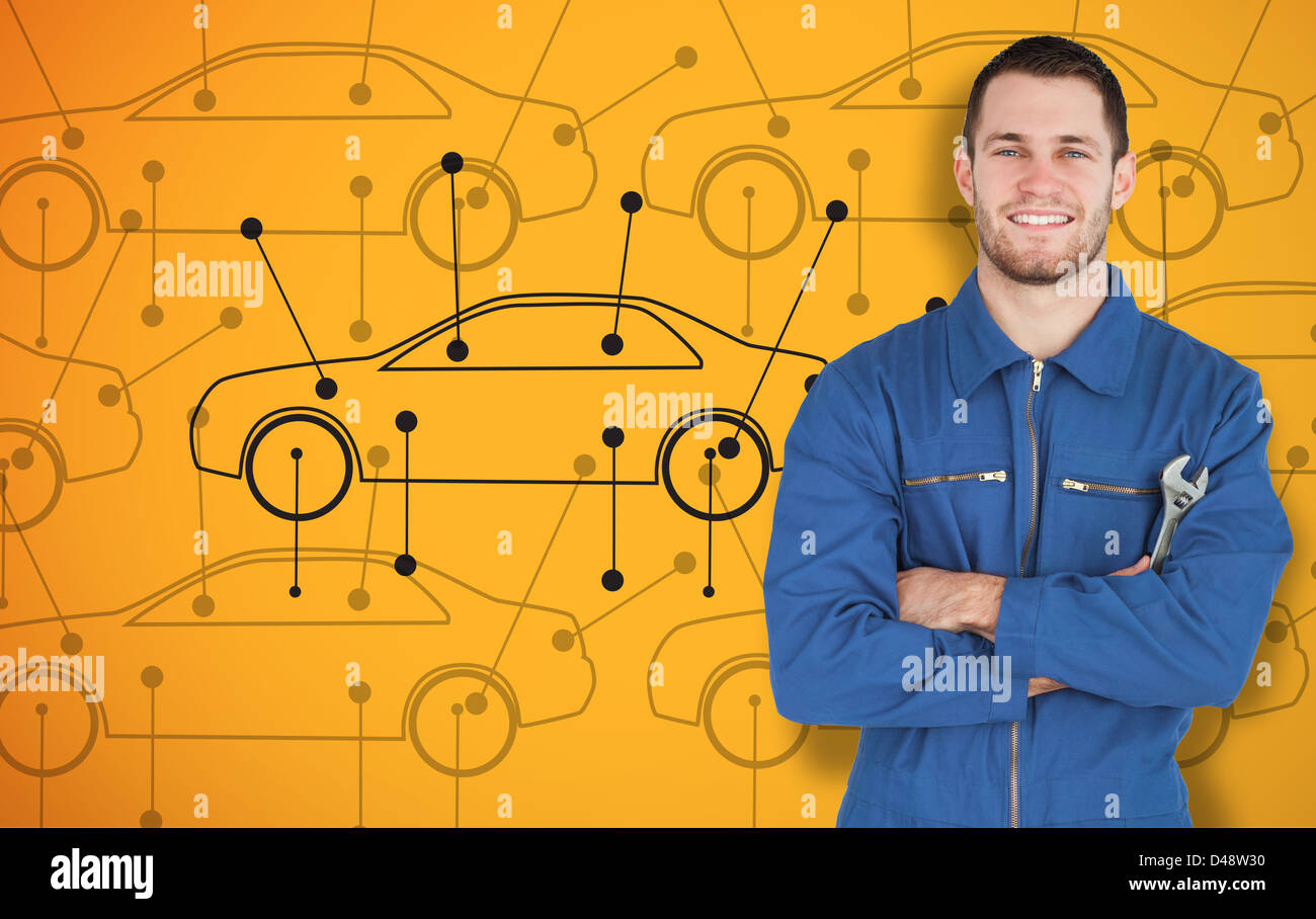 Young smiling mechanic standing in front of cars background Stock Photo ...