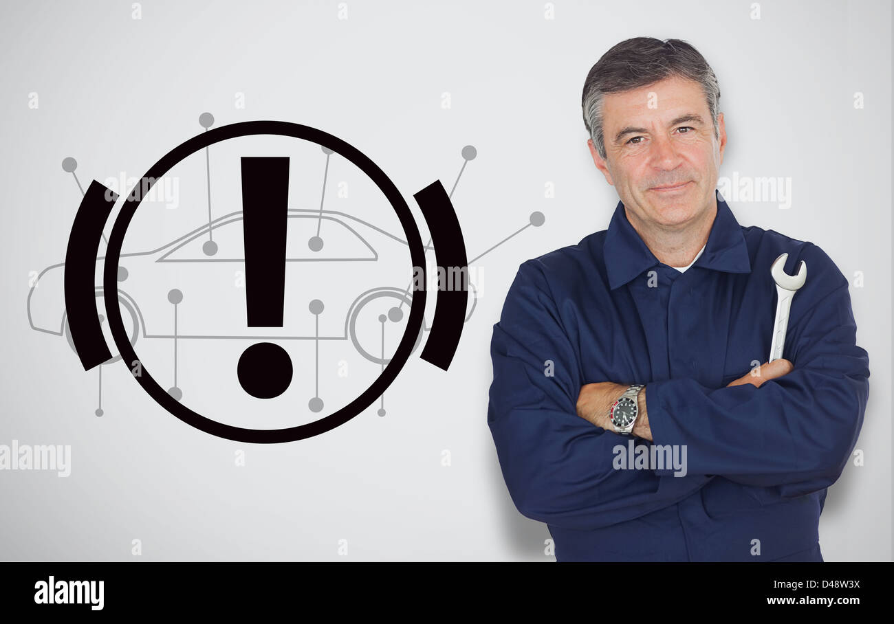 Mature mechanic standing next to hand break signal Stock Photo - Alamy