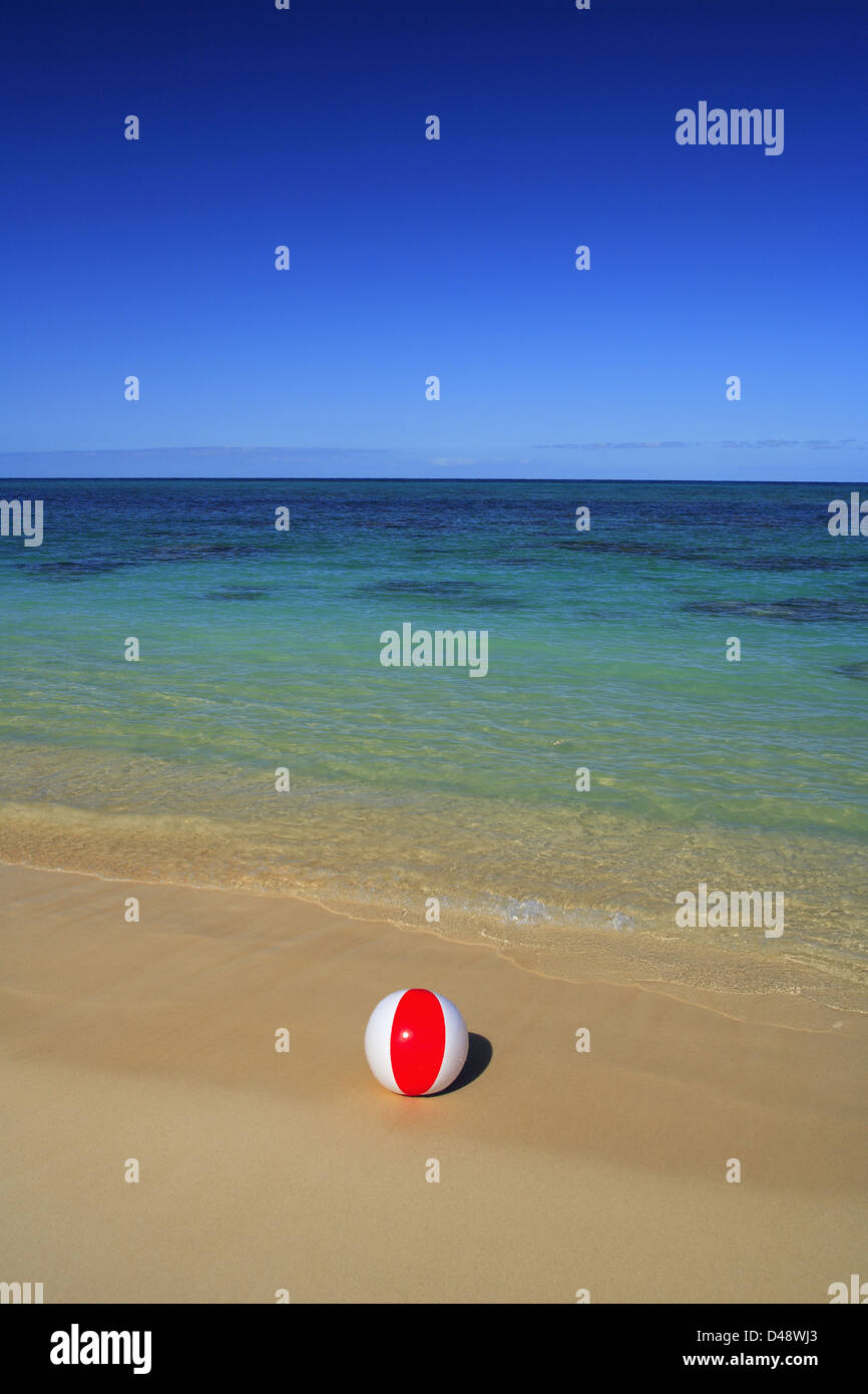 Colorful Beachball On The Shore Of A Tropical Beach Stock Photo - Alamy