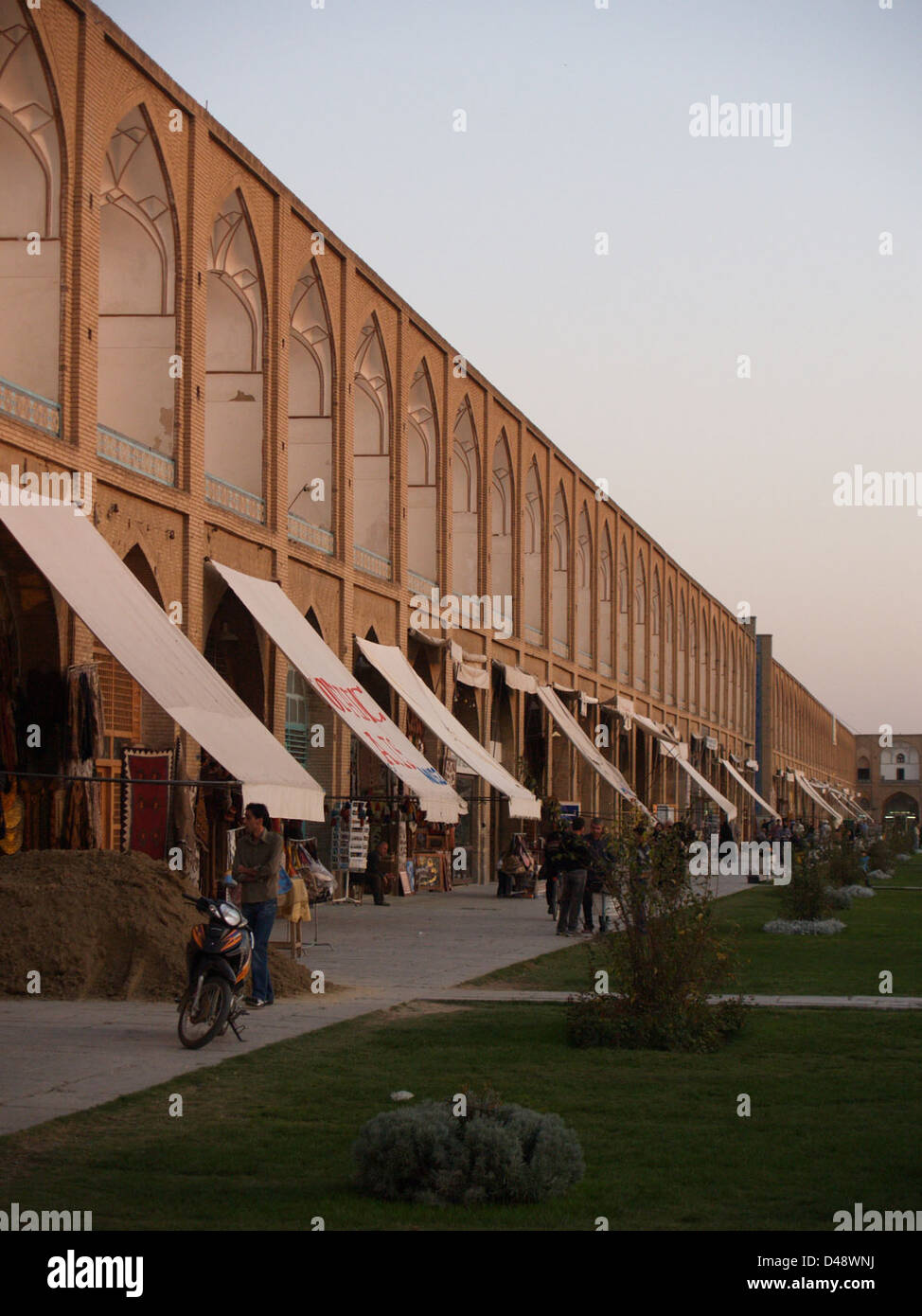 A sunset view over Imam Khomeini Square in Isfahan, Iran, captured in ...