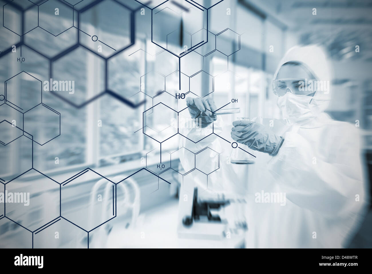 Chemist working cautiously with liquid helped by futuristic interface ...