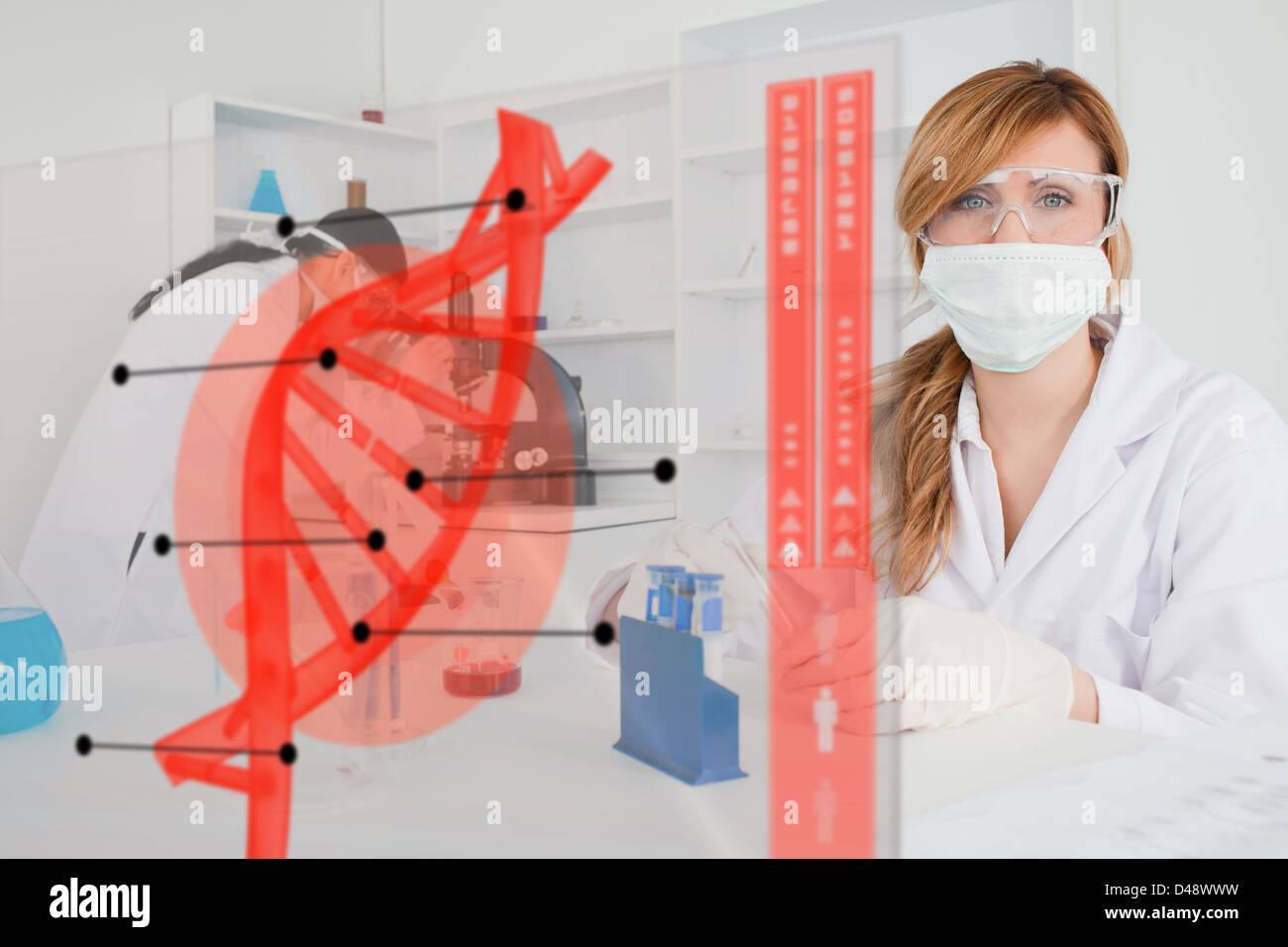 Chemist working in protective suit with futuristic interface in front ...