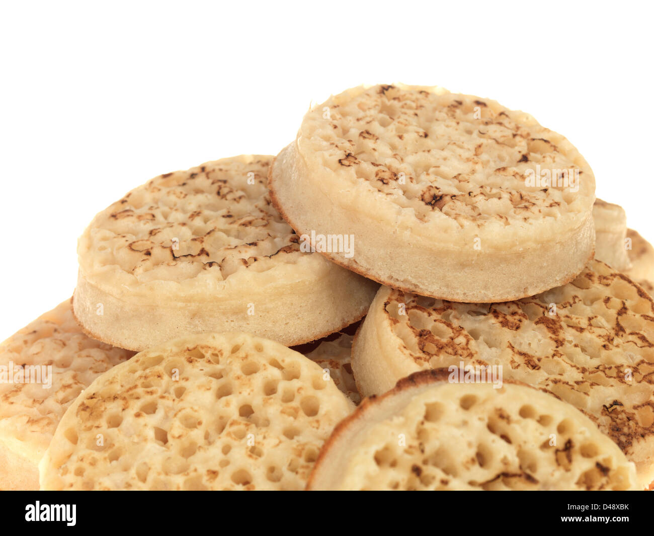 Fresh Traditional British Crumpets, Isolated Against White, With ...