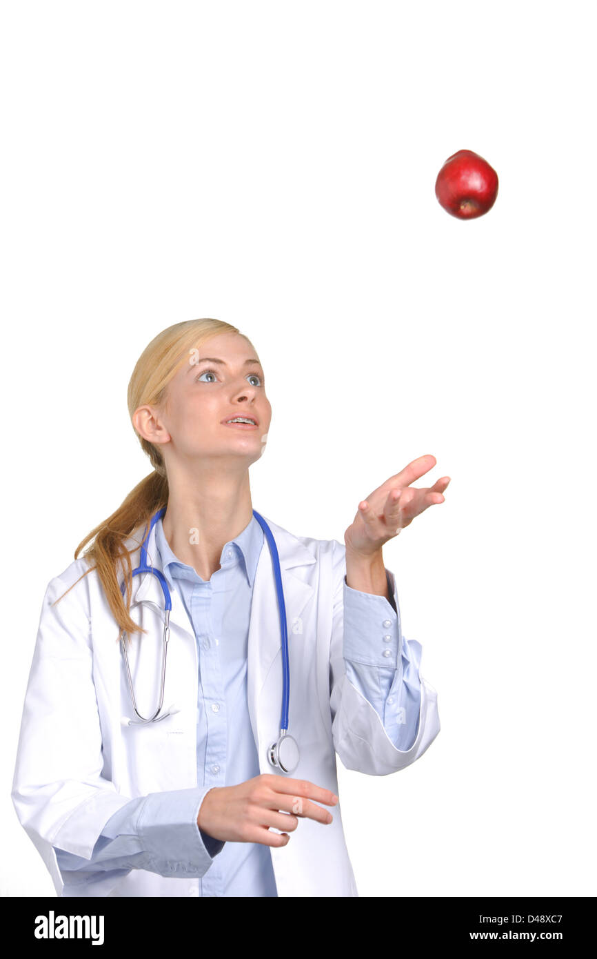 Throwing an apple Cut Out Stock Images & Pictures - Alamy
