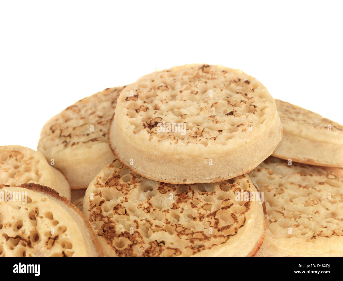 Fresh Traditional British Crumpets, Isolated Against White, With ...