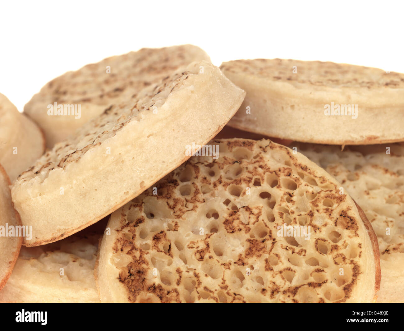 Fresh Traditional British Crumpets, Isolated Against White, With ...