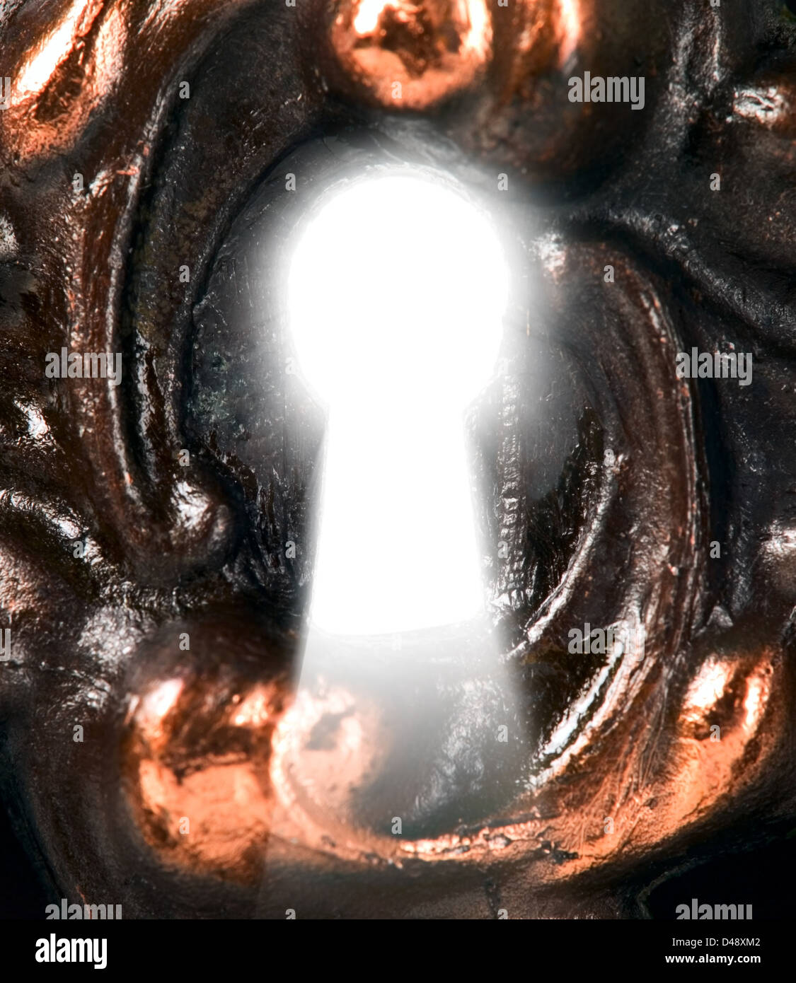 Light is coming through the hole of key, hope concept Stock Photo - Alamy