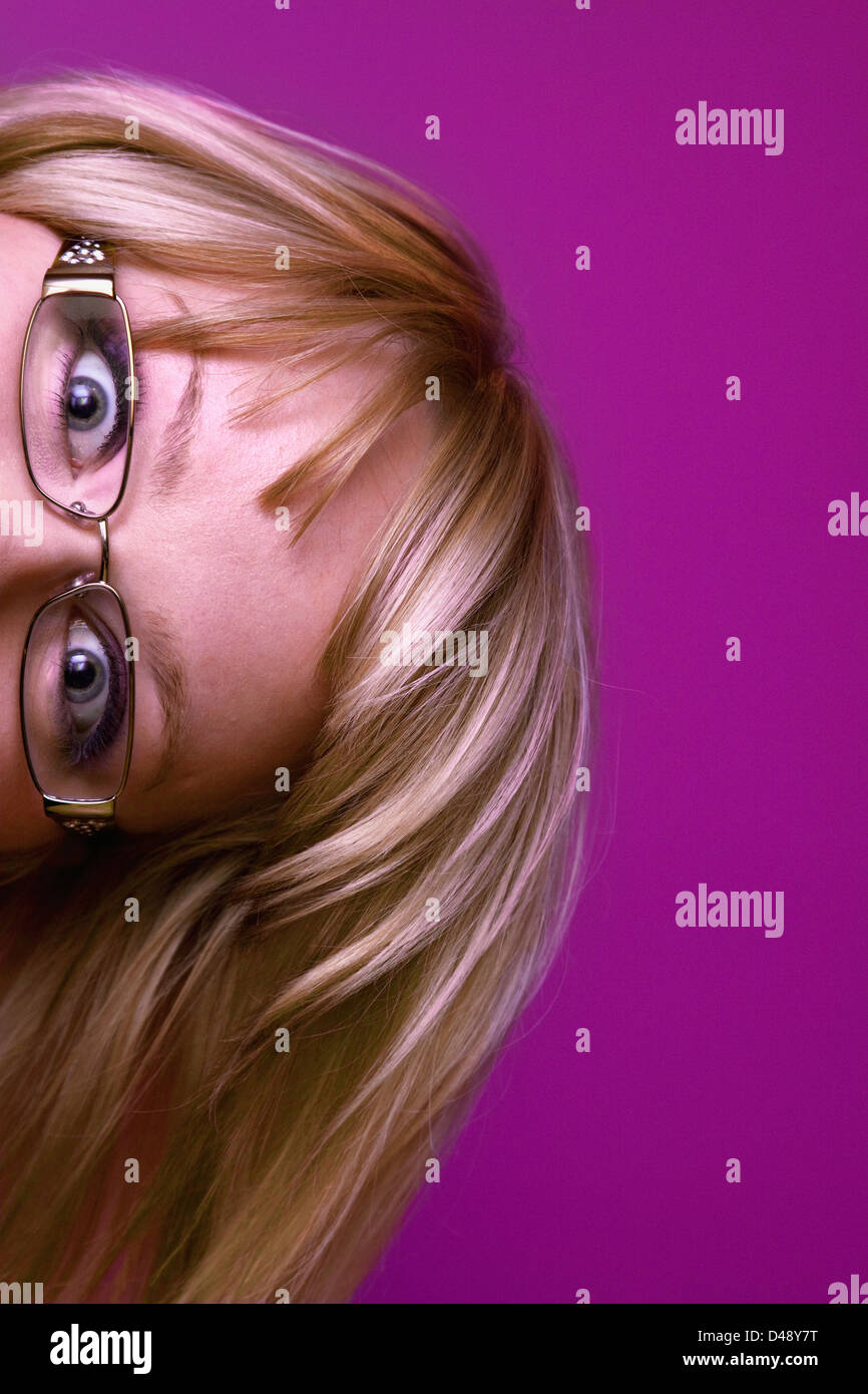 Top Of A Woman's Head With Eyeglasses Peering Sideways From The Side Of ...