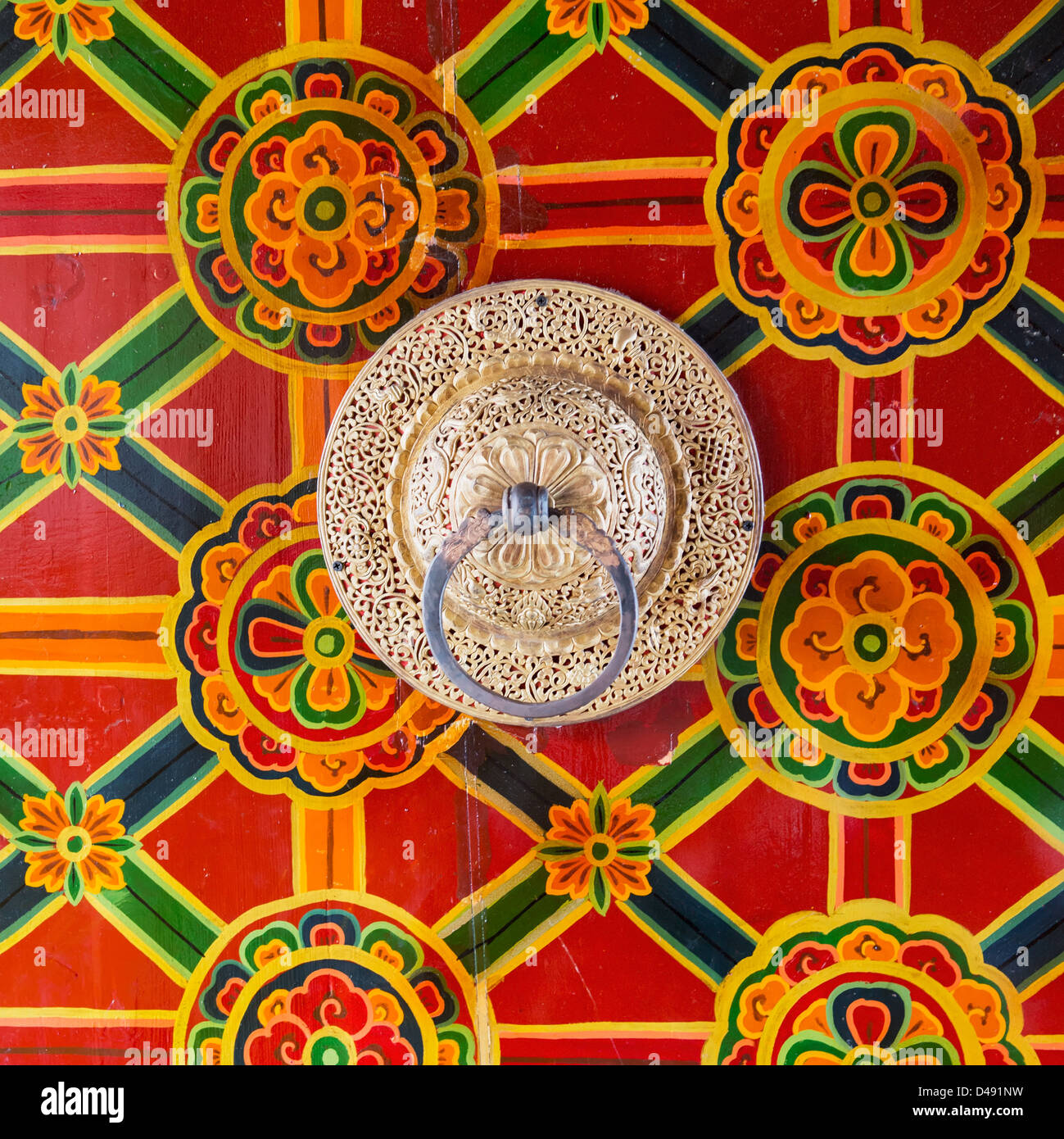 Colourful door with floral design and handle at jokhang temple;Lhasa ...