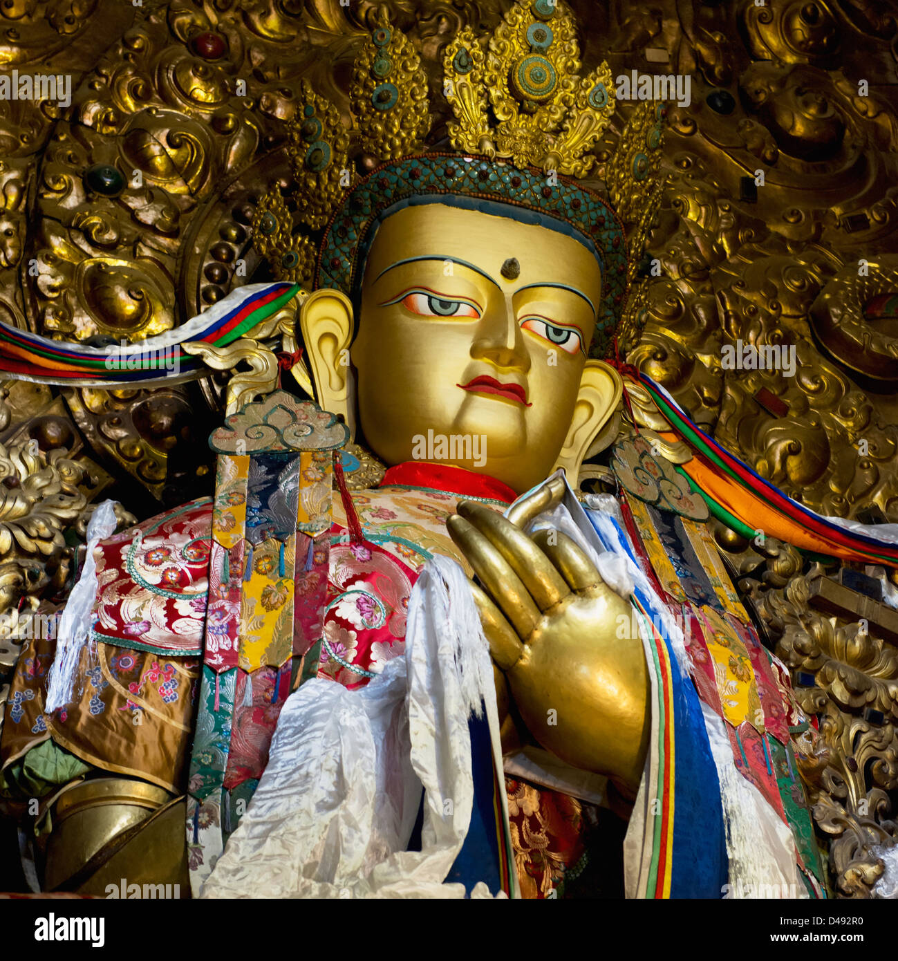 Gold statue with colourful decor in drepung monastery;Lhasa xizang ...