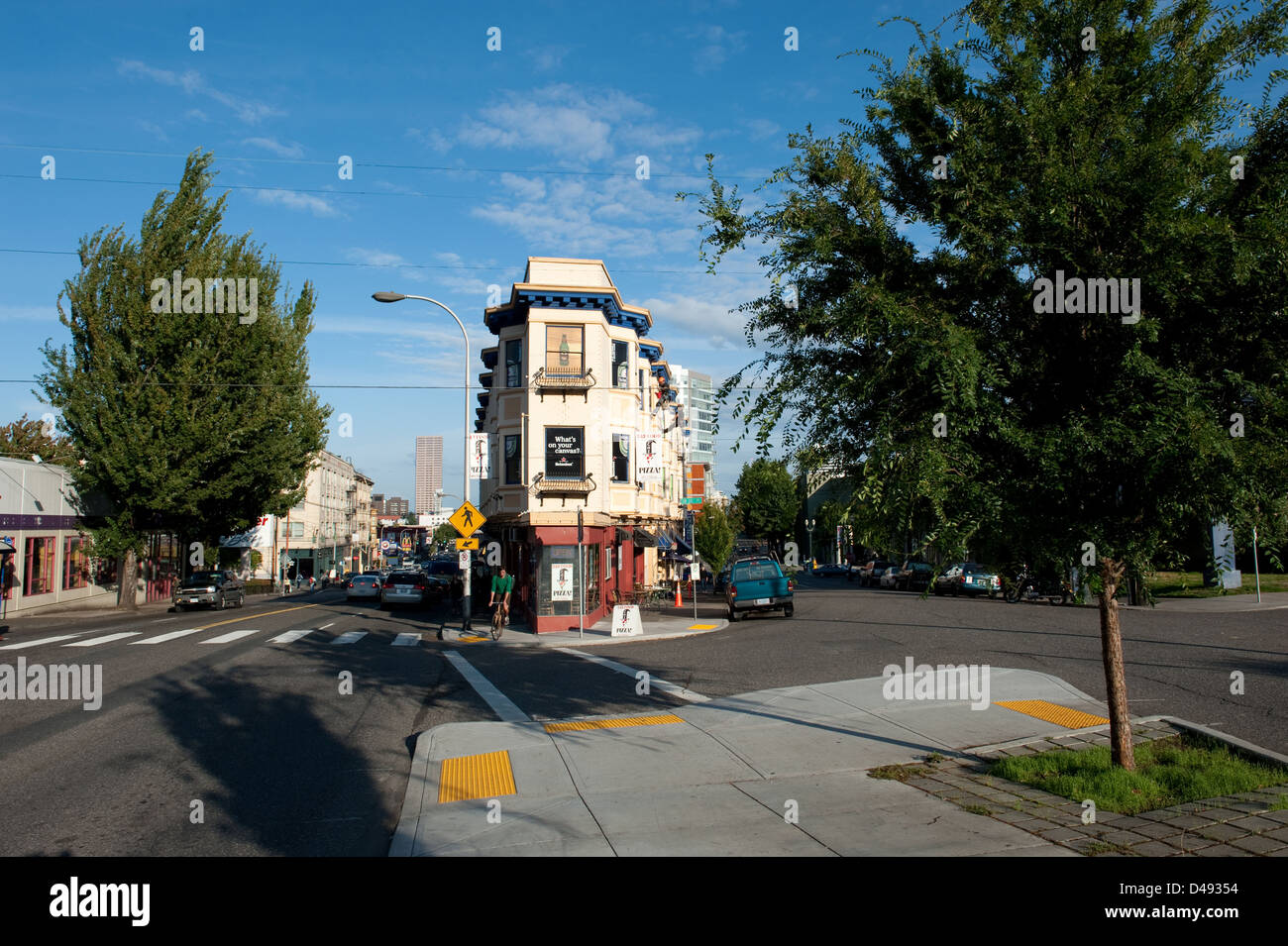Portland, Oregon, a renovated corner house in late afternoon light ...