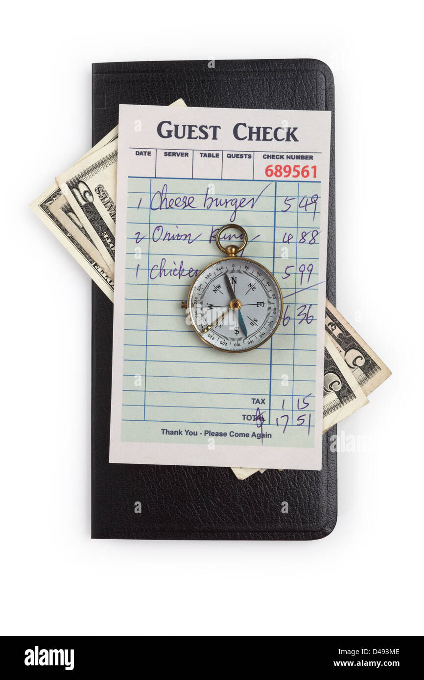 Guest Check and compass, concept of restaurant expense Stock Photo - Alamy