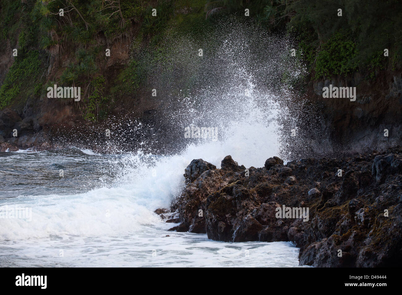 Waves hitting rock at a beach in The Big Island, Hawaii, USA Stock ...