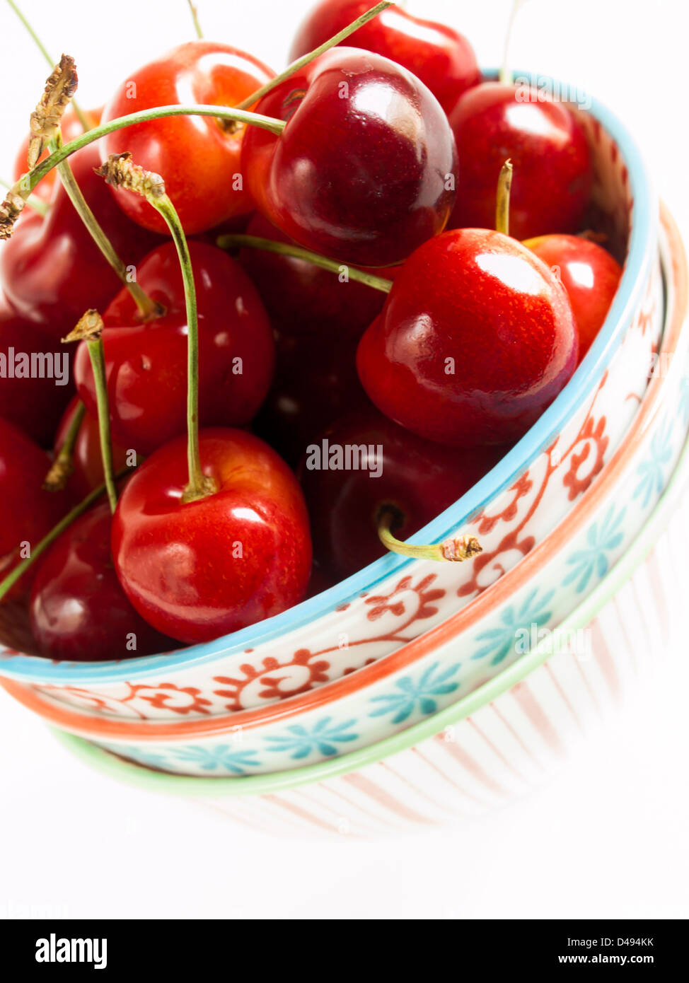 Freshly picked heap of cherries in bowl Stock Photo - Alamy