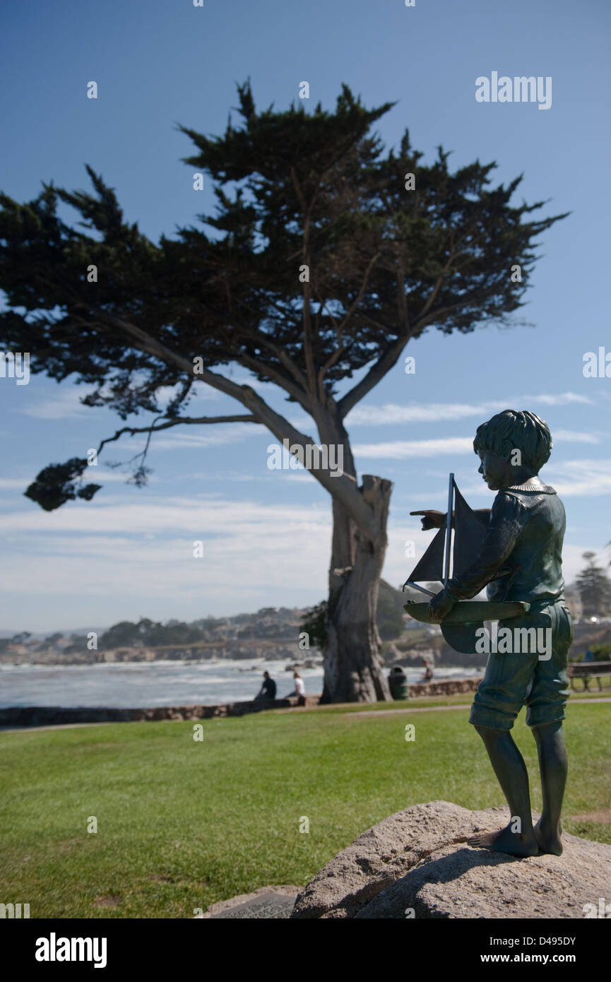 Monterey, USA, Statue of a boy with a sailboat in the hand Stock Photo ...