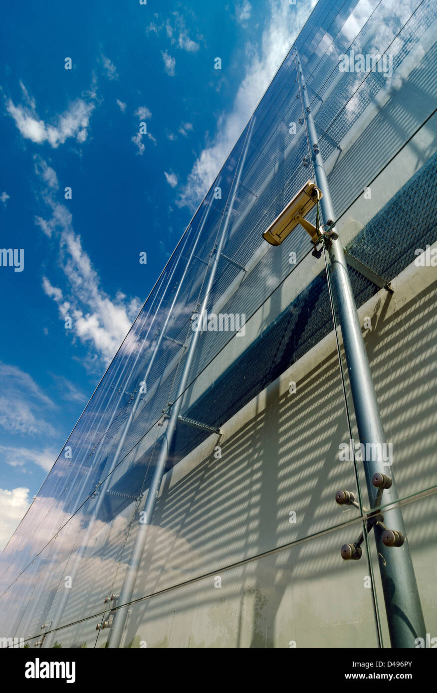 security camera in a glass facade Stock Photo - Alamy