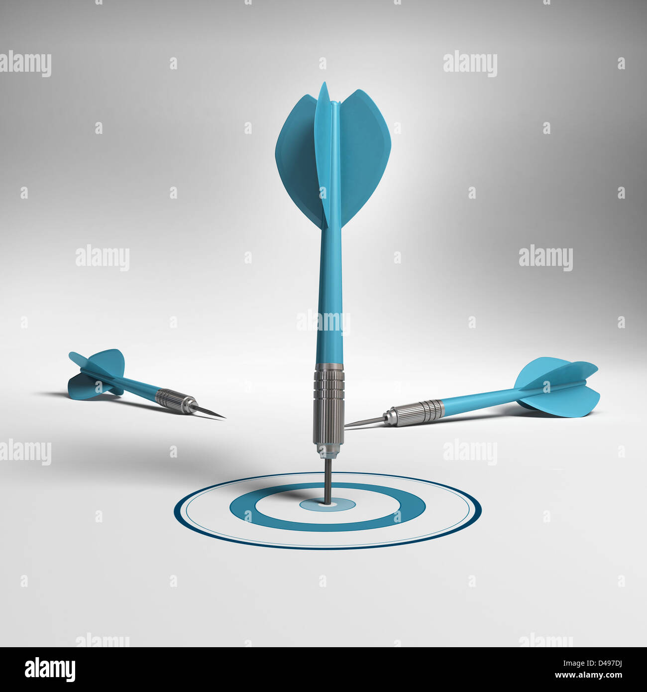 One dart hitting the mark, the target is blue. there is two other darts ... One dart hitting the mark, the target is blue. there is two other darts ...