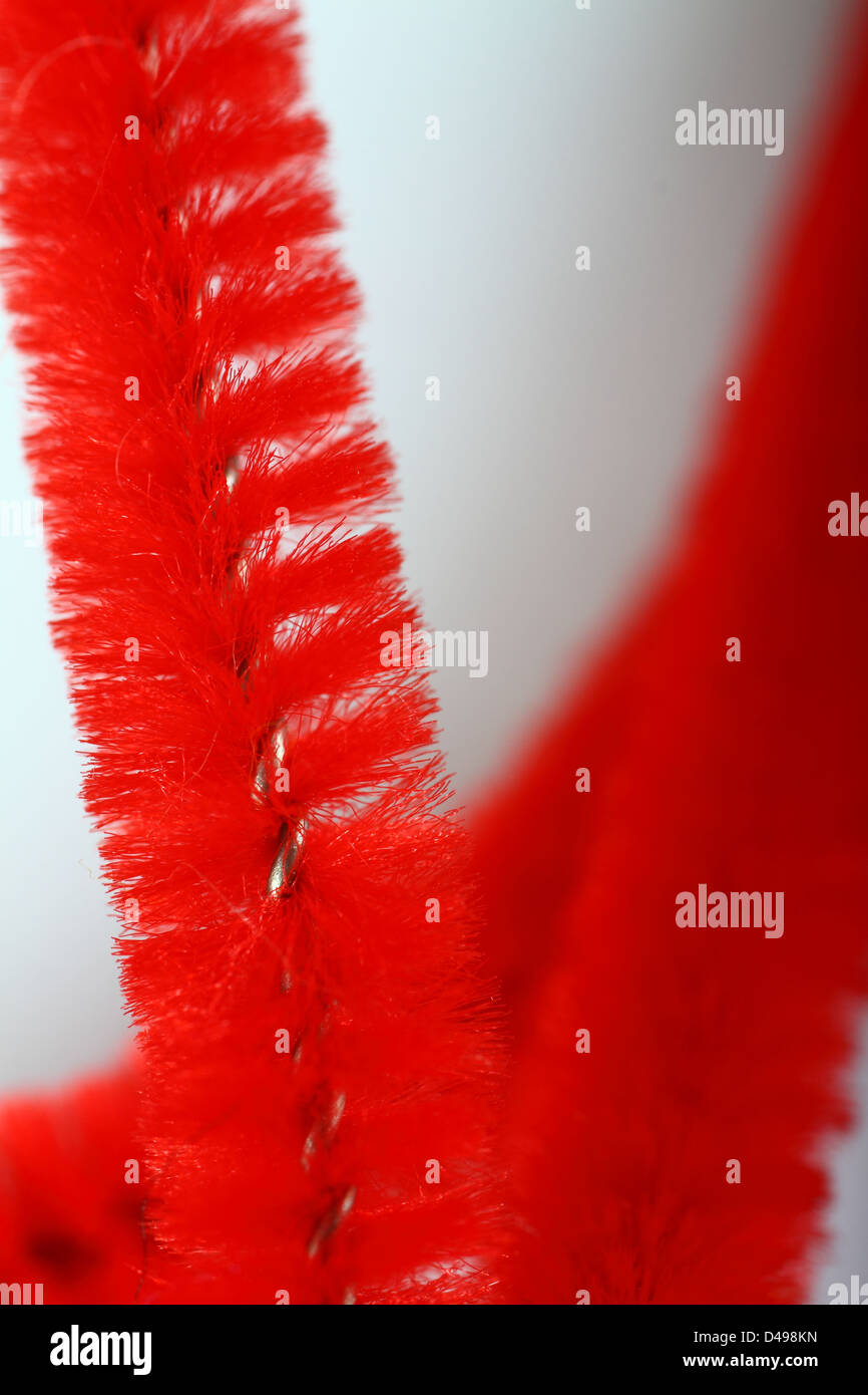 Abstract view of red pipe cleaners Stock Photo - Alamy