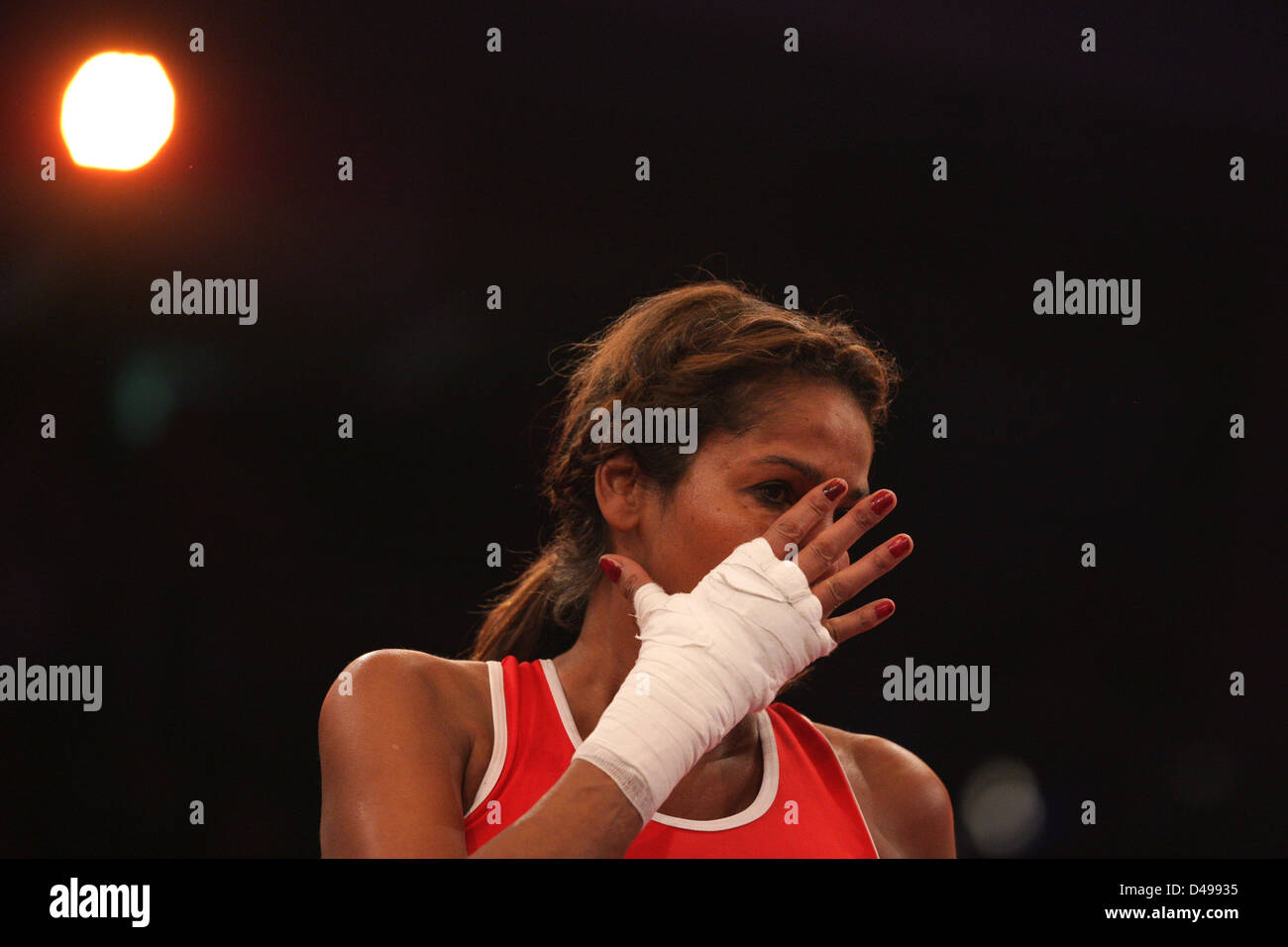 Celebrity boxer Nadja Abd El Farrag rubs her nose during fight against ...